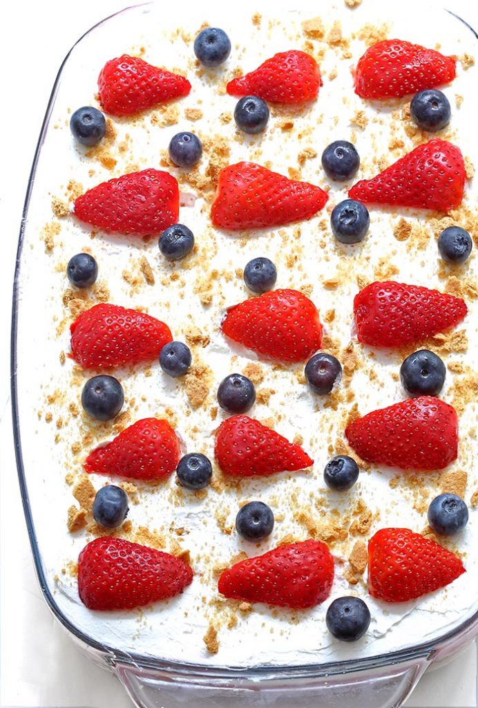 Summer Berry Cheesecake Poke Cake - Cakescottage